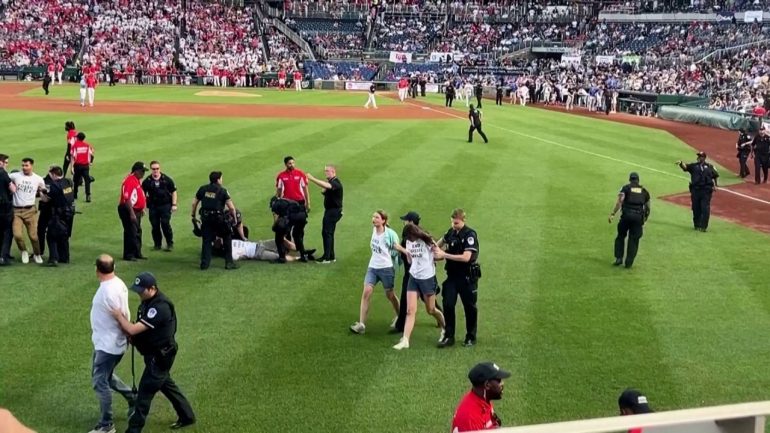 MLB Game Ends in Chaos as Climate Protesters and Fan Storm the Field ...